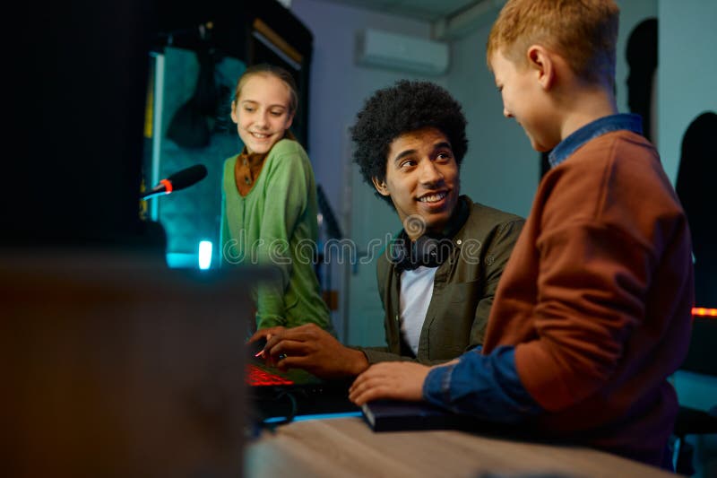 A Producer Mixing Track with Children Band Stock Photo - Image of ...