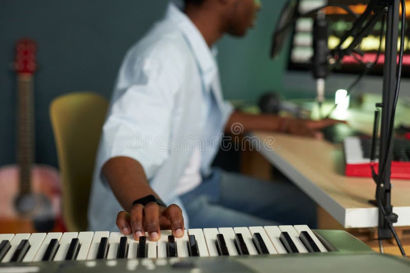 Producer Playing Synthesizer in Studio Stock Photo - Image of monitor ...