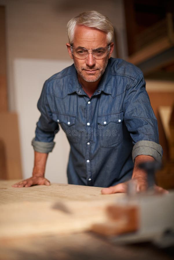 He Produces Work of the Highest Standard. a Mature Male Carpenter ...