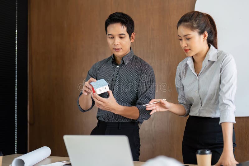 Product Development and Consultation. Engineers Demonstrating Scale ...