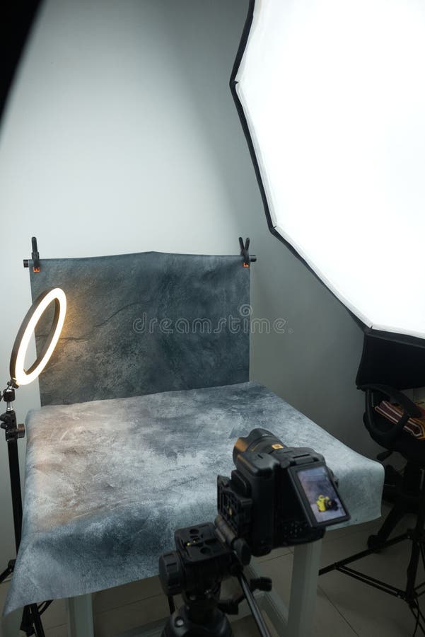 Product Photo Room with Table Makeup and Camera and Lights Stock Photo ...