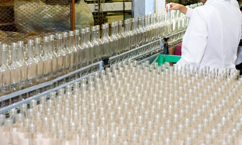 Production of Alcohol Drinks Stock Photo - Image of conveyor, beverage ...