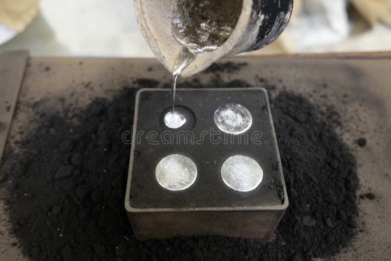 Production of Aluminum Coins Stock Photo - Image of symbol, melted ...