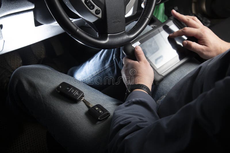 Production of Car Keys, Programming of Car Keys and Repair Stock Image ...