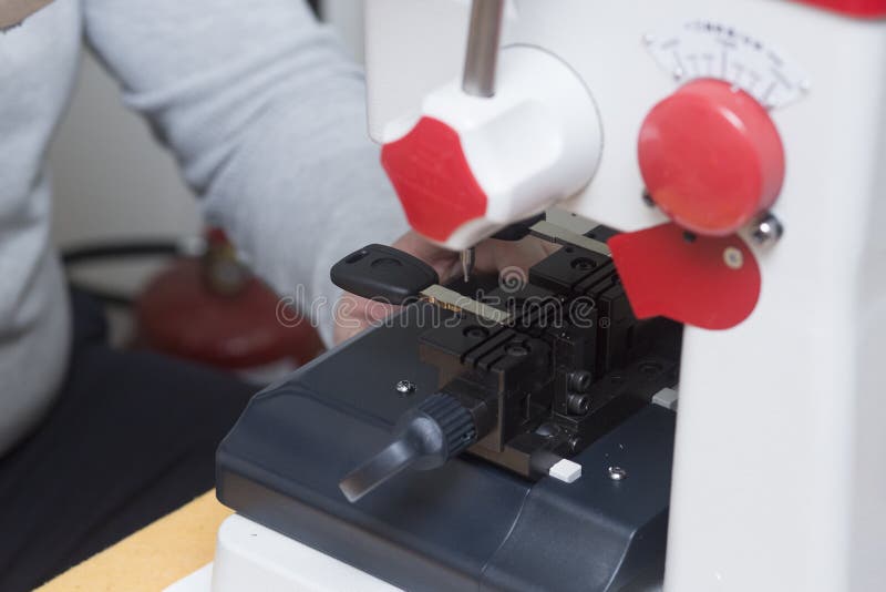 Production of Car Keys on a Specialized Key Machine Stock Photo - Image ...