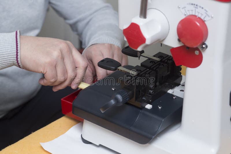 Production of Car Keys on a Specialized Key Machine Stock Photo - Image ...