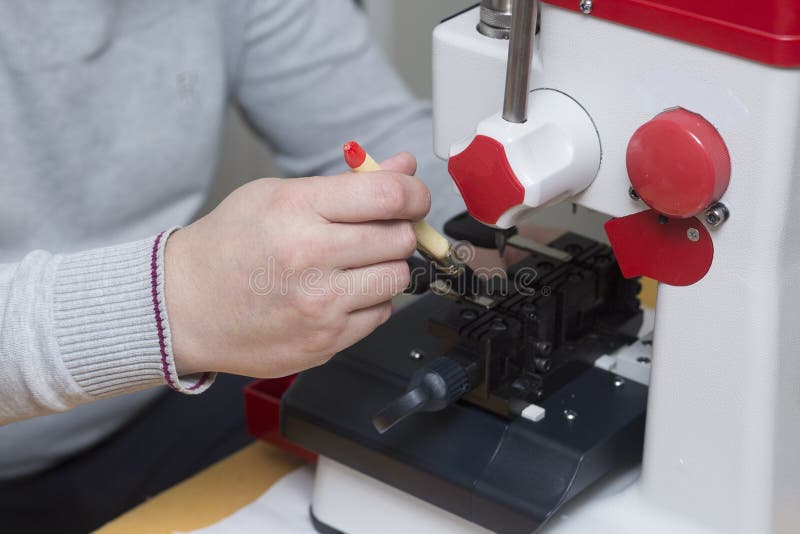 Production of Car Keys on a Specialized Key Machine Stock Photo - Image ...