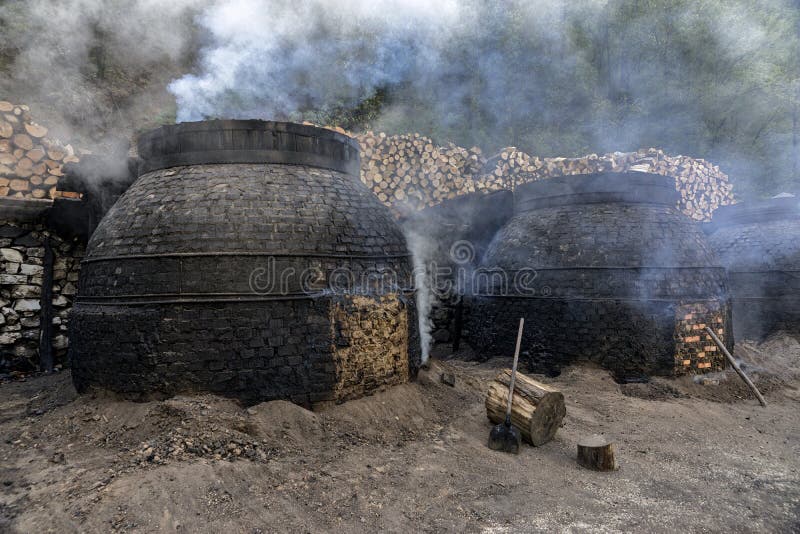 The Production of Charcoal in a Traditional Manner Stock Photo - Image ...