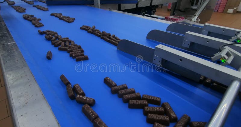 Production of Chocolates. Automated Chocolate Production Line at the ...