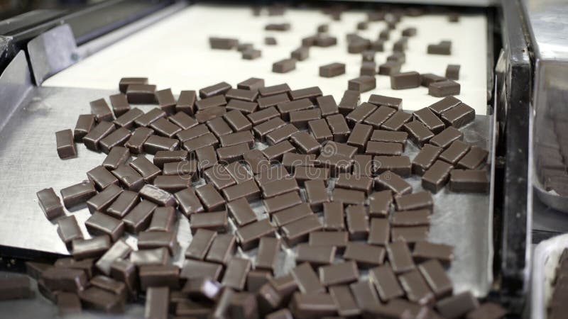 Production Line for the Production of Chocolates. Candy Covered with ...