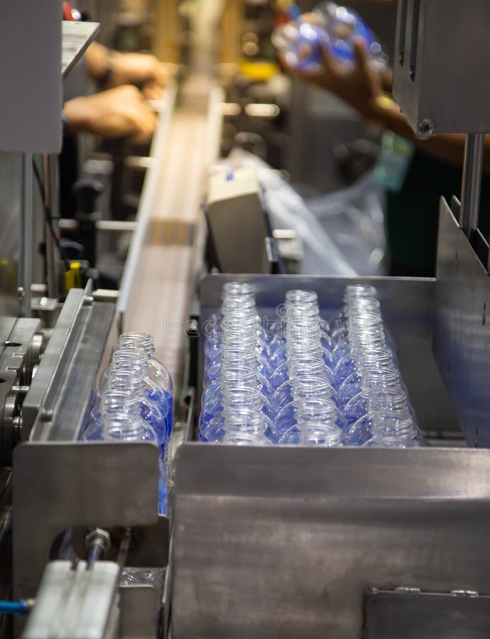 Production Line Collecting Empty Plastic Bottle From Blowing Machine ...