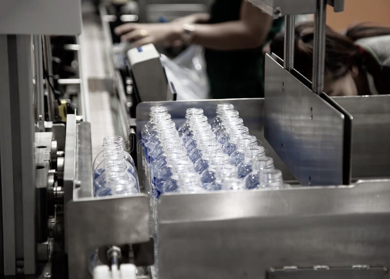 Production Line Collecting Empty Plastic Bottle from Blowing Machine ...