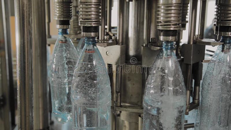 The Process of Filling Water into a Bucket for Household Use Stock ...