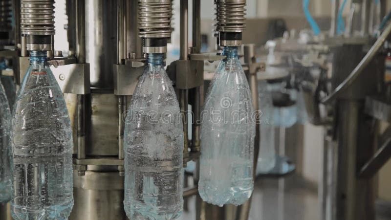 The Process of Filling Water into a Bucket for Household Use Stock ...