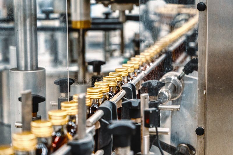 Production Line with Numerous Closed Bottles of Cognac Stock Image ...