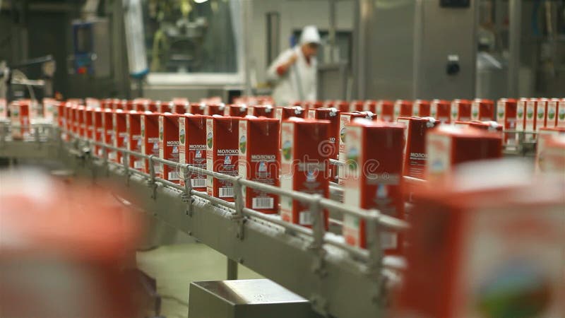 Production Line and Cartons Being Transported by Conveyor Stock Footage ...