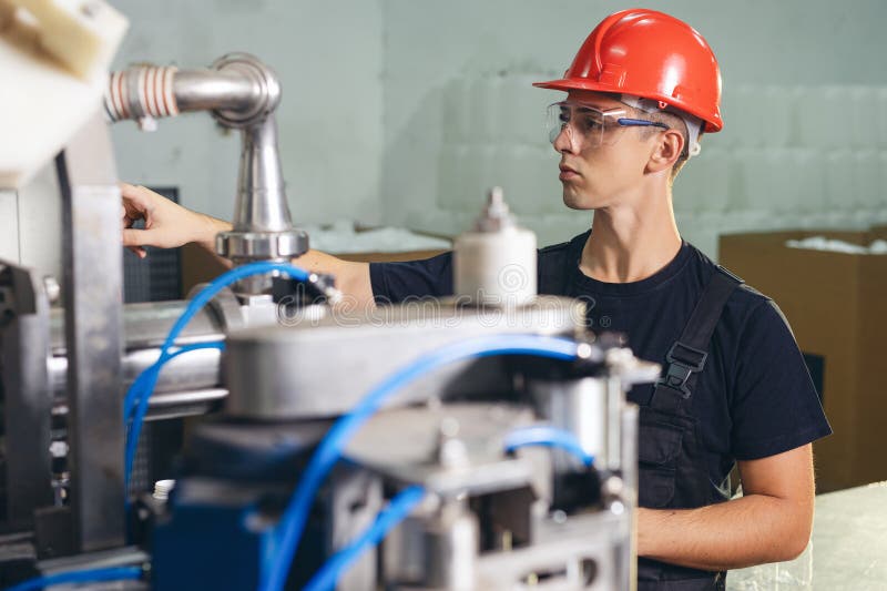 Production Line Worker or Technologist in Uniform Working in Chemical ...