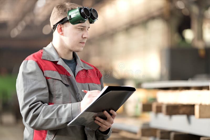 Production Man Worker on Manufacture Workshop Background Stock Photo ...