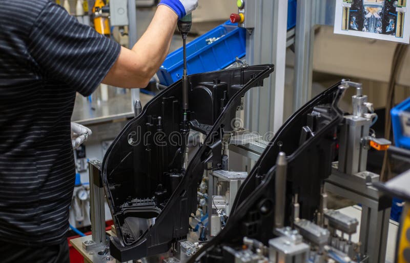 Production Operator Assembling Frontlight Headlamp, Headlight for a ...