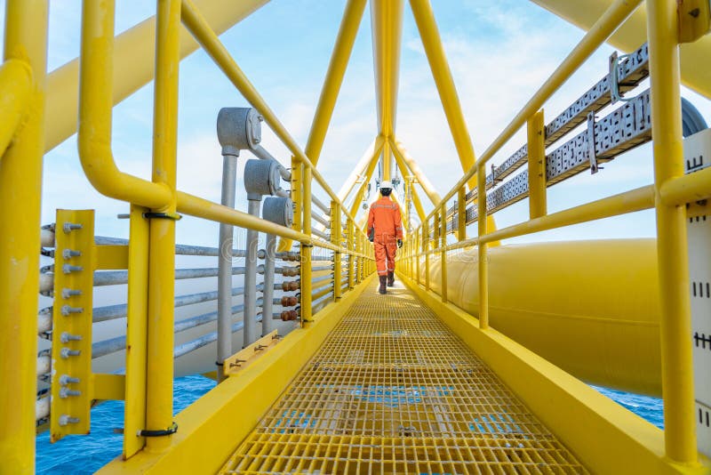 Production Operator Walking on Offshore Oil and Gas Central Processing ...