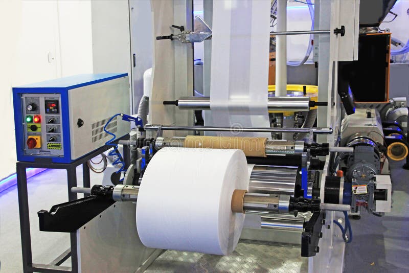 Production of plastic bags stock photo. Image of polypropylene - 153103218