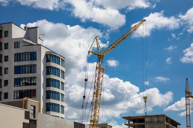 Production Process in the Construction of a New House. Lifting Crane at ...