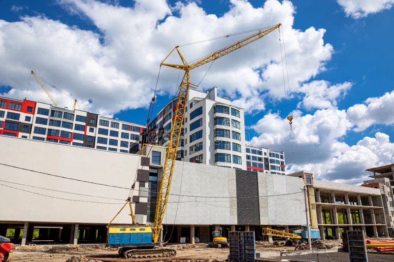 Production Process in the Construction of a New House. Lifting Crane at ...