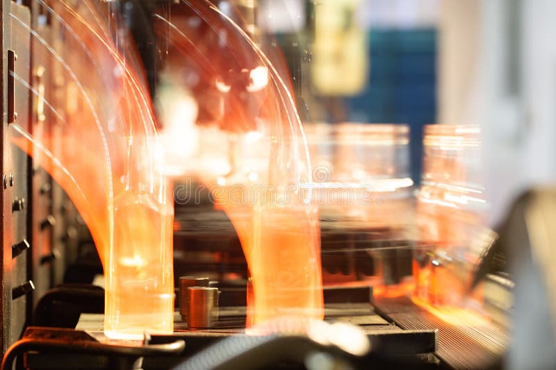 The Production Process of Glass Bottles on Moving Conveyor Stock Photo ...