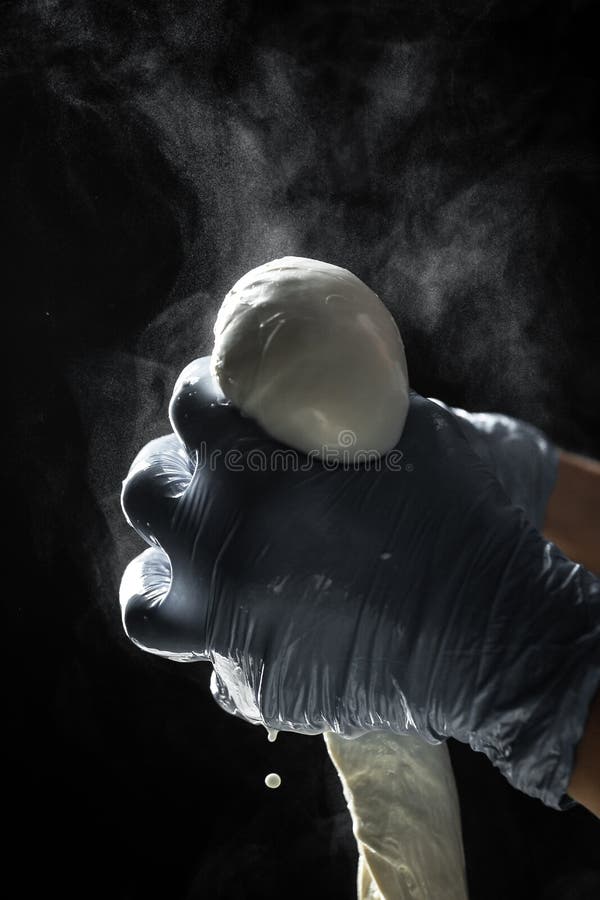Production Process of Mozzarella Cheese. Woman Working in a Small ...