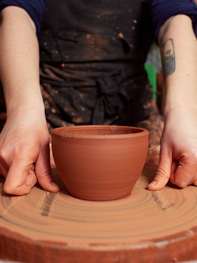 The Potter Works in the Main Workshop. Stock Image - Image of woman ...