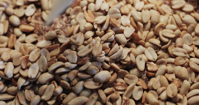 Production Process of Roasted Crunchy Nuts. Stock Footage - Video of ...