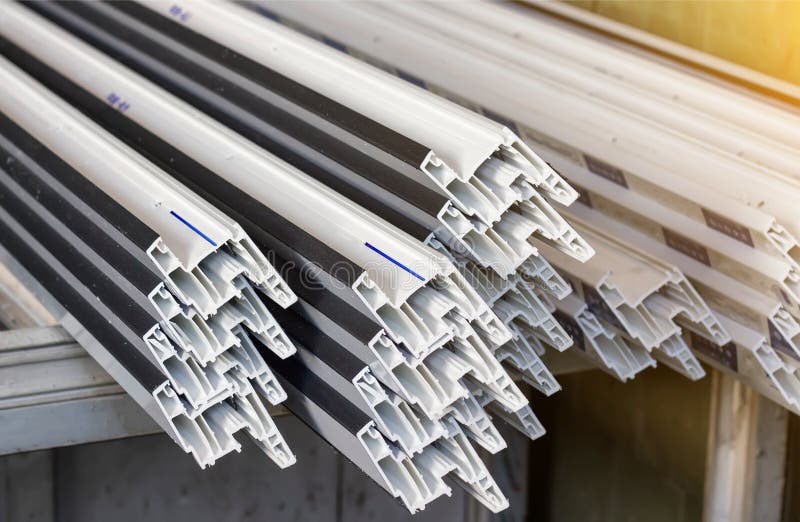Production of Pvc Windows, Plastic Pvc Profile Lies on the Table, Close ...
