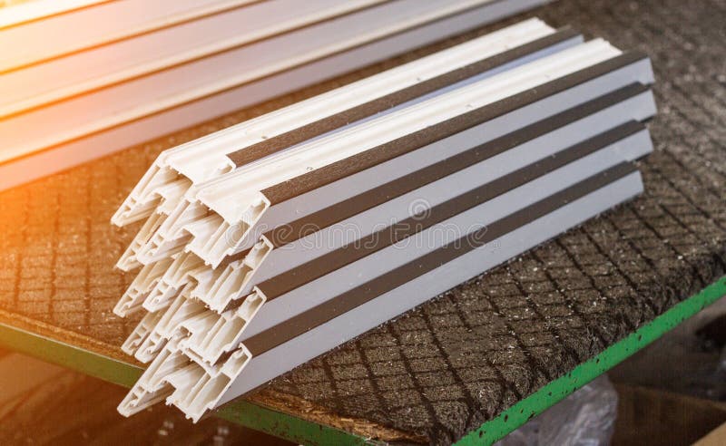 Production of Pvc Windows, Plastic Pvc Profile Lies on the Table, Close ...