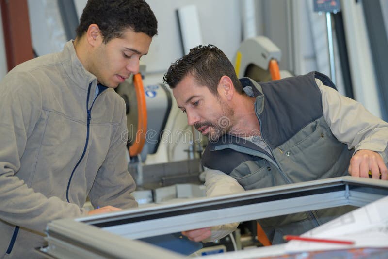 Production Smiling Workers in Coverall with Different Pvc Window Stock ...
