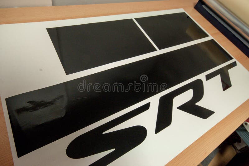 Production of Stickers Cut from Black Glossy Foil. Editorial Stock ...