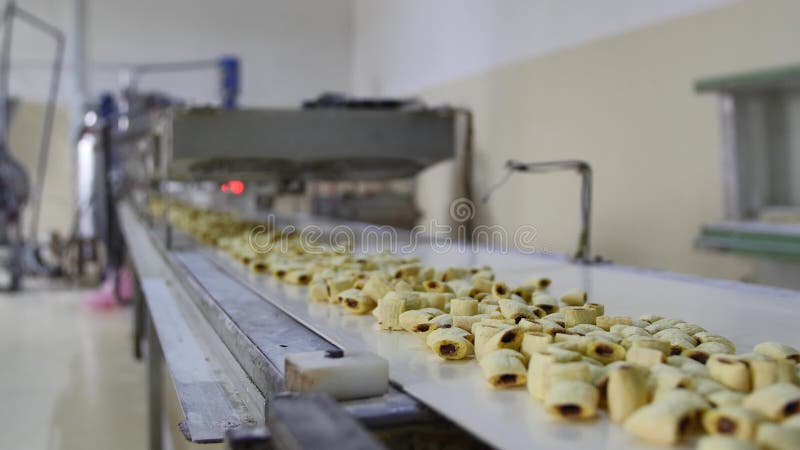 Snacks Production Are Moving On Conveyer At The Factory Stock Footage ...