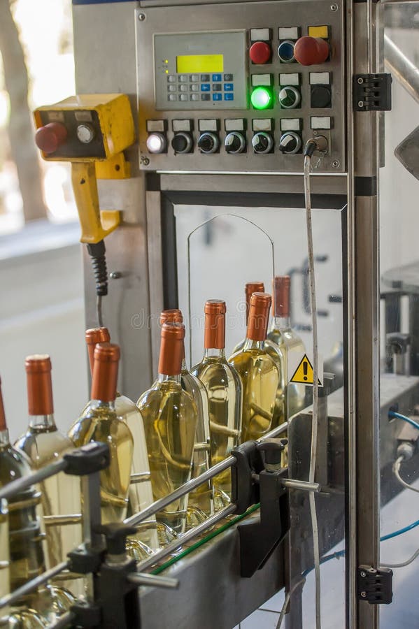 Production of wine bottles stock photo. Image of equipment - 85404888