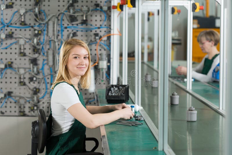 Female Assembly Line Workers Stock Photo - Image of female, indoor ...
