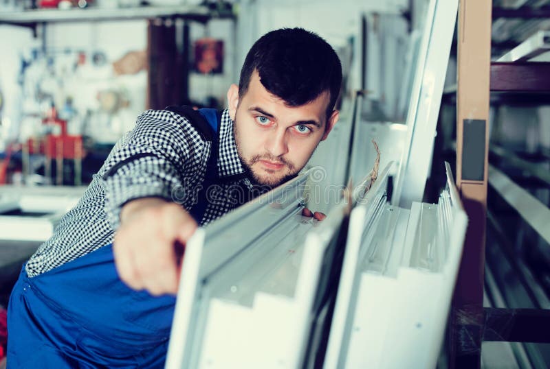 Production Worker with PVC Windows Stock Photo - Image of profile, blue ...