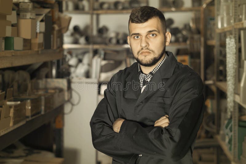 Production Worker in Uniform Displaying His Workplace Stock Image ...