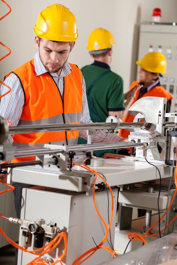 Production Workers during Job Stock Photo - Image of equipment ...