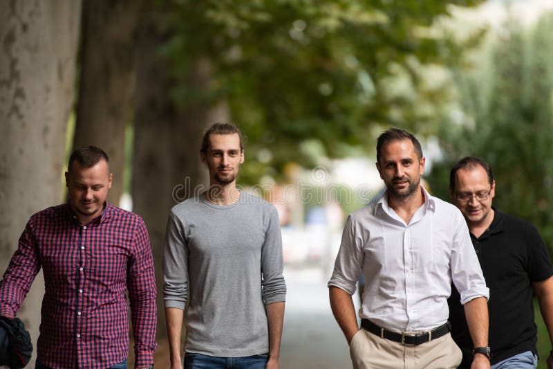 After a Productive Day at Work, a Group of Diverse Colleagues Enjoy a ...