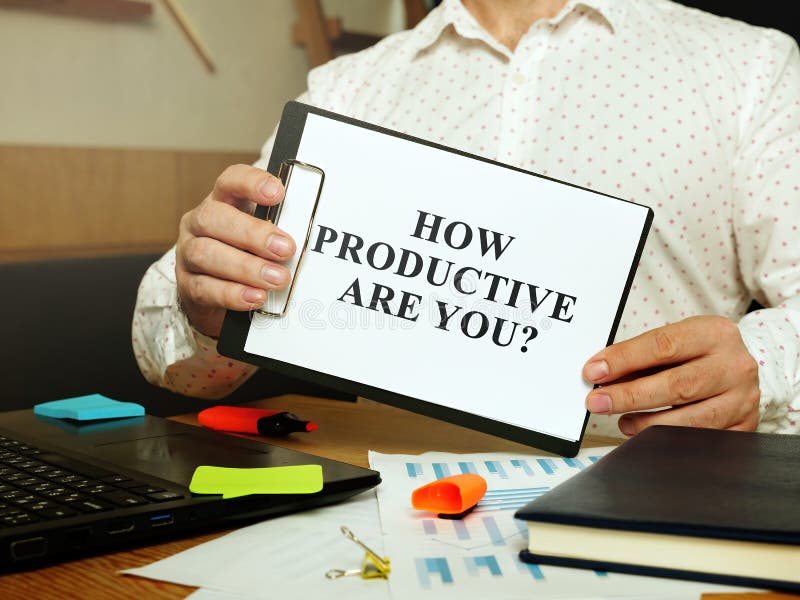 Productivity Concept. Man is Holding Question How Productive are You ...
