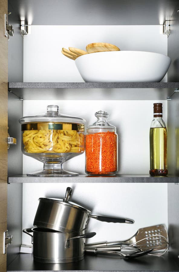 Products and Kitchen Utensils on Shelving Unit Stock Image - Image of ...