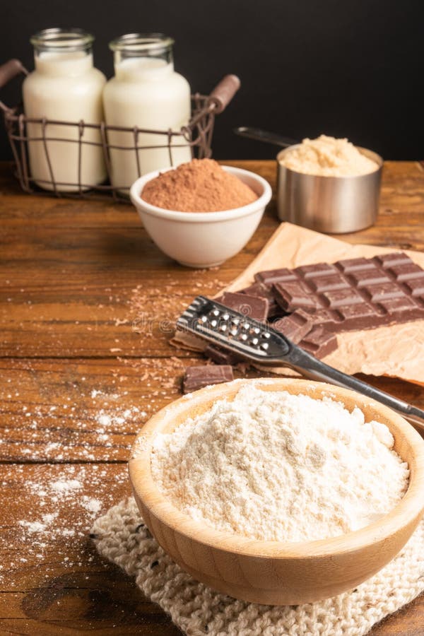 Products and Objects for Baking Chocolate Cake on Dark Wooden Table ...