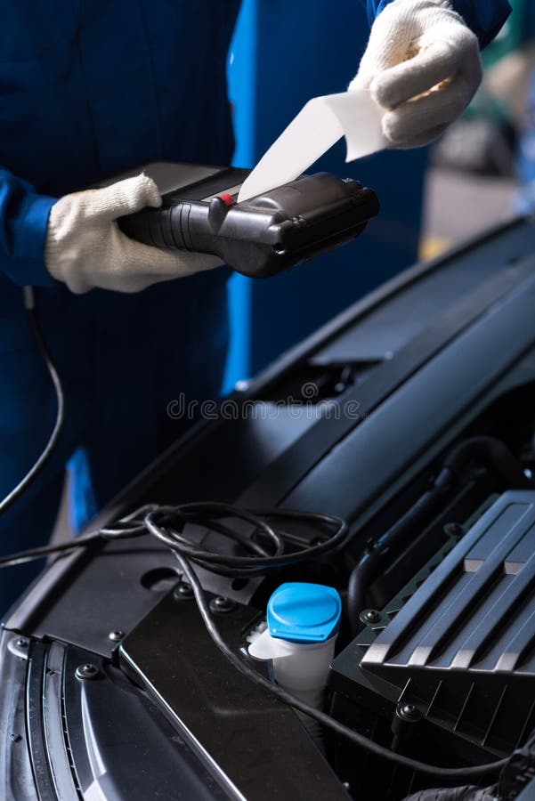 Professioanl Auto Mechanic Checking Engine Stock Image - Image of ...