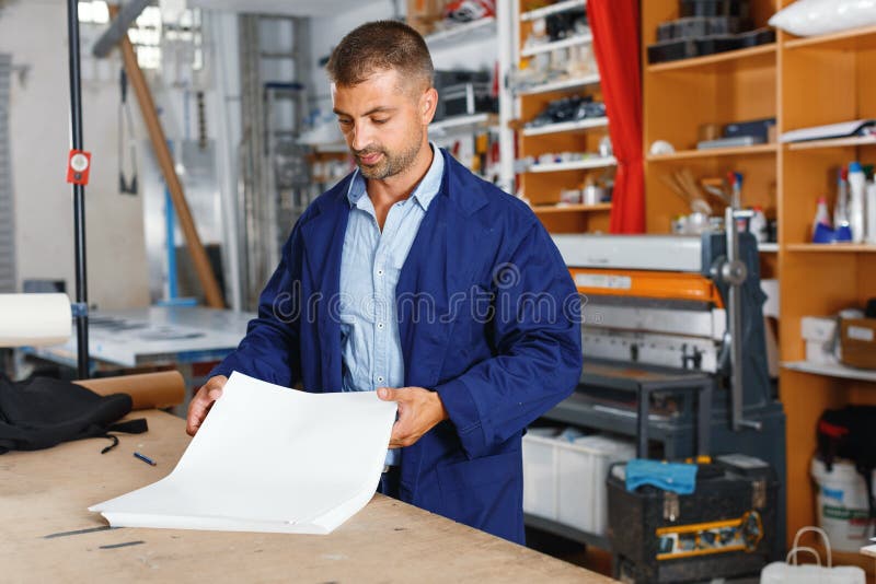 Profession,job,people,workman in Special Clothes with Paper Stock Photo ...