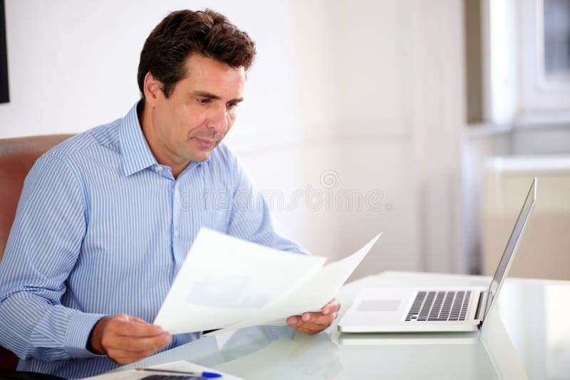Professiona Businessman Looking at His Documents Stock Image - Image of ...