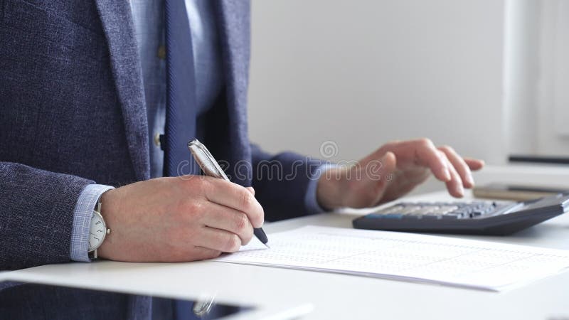 Professional Accountant Calculating Expenses, Documenting Financial ...