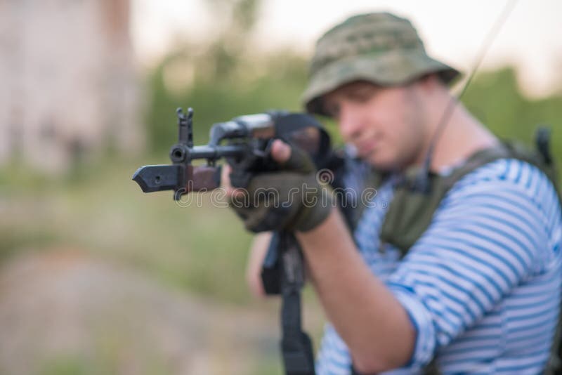 A Professional Airsoft Player Aims at His Opponents. Stock Image ...